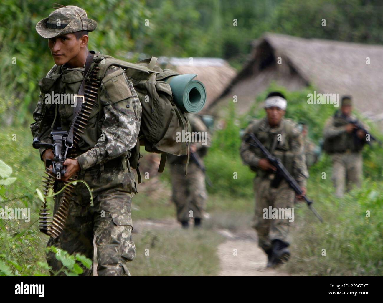 In this photo taken April 23, 2009, police officers patrol to combat ...