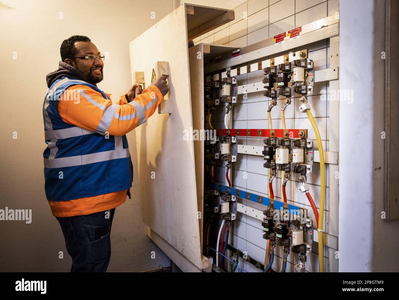 HAARLEM - An employee of Alliander on a project of network operator ...