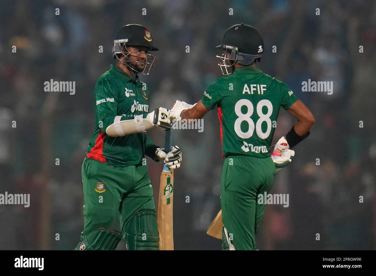 Bangladesh's captain Shakib Al Hasan, left, celebrates with batting ...
