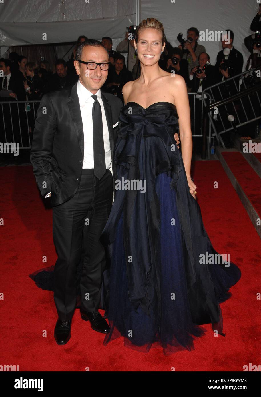 Designer Gilles Mendel and Heidi Klum arrive at the Metropolitan Museum ...