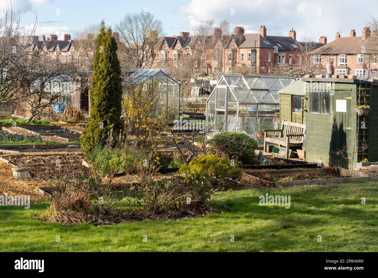 Allotment in the month of March, with sheds, greenhouses and raised ...
