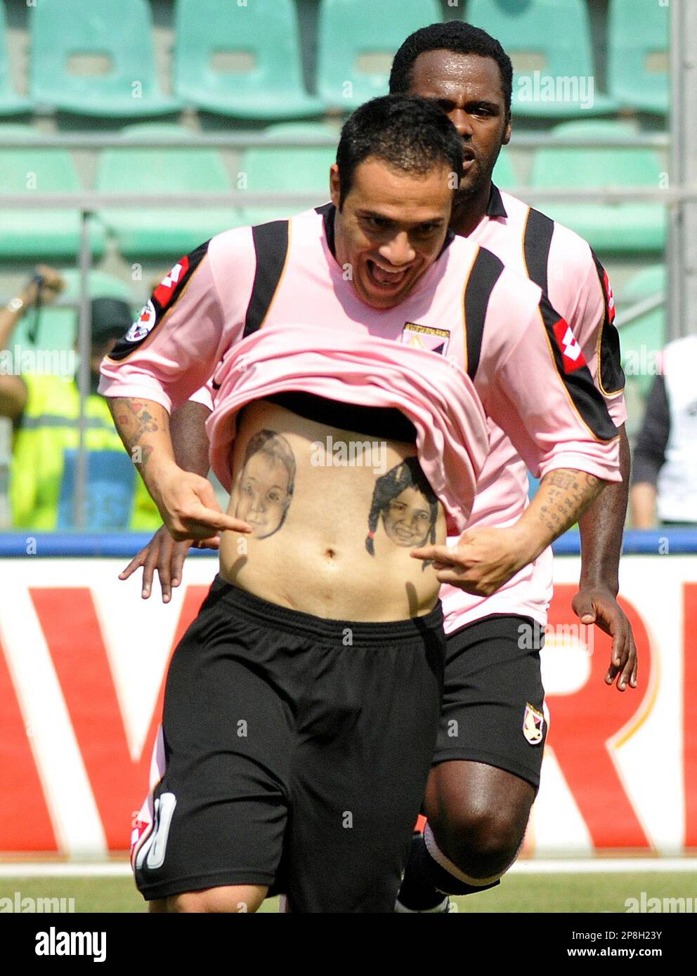 Palermo's Fabrizio Miccoli celebrates after scoring during a Serie A ...