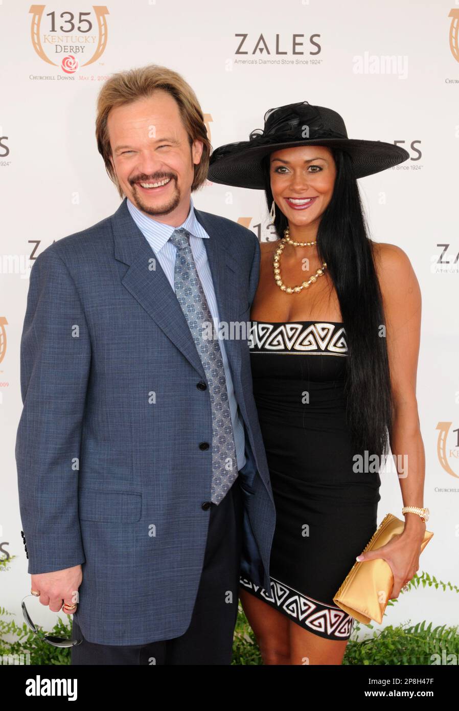 Travis Tritt and his wife, Theresa, arrive at the 135th Kentucky Derby ...