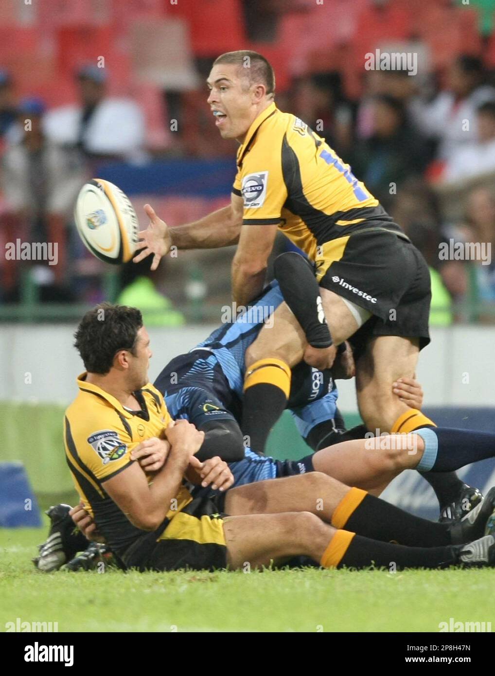 Australia's Western Force's Scott Staniforth, lets go of the ball as he ...