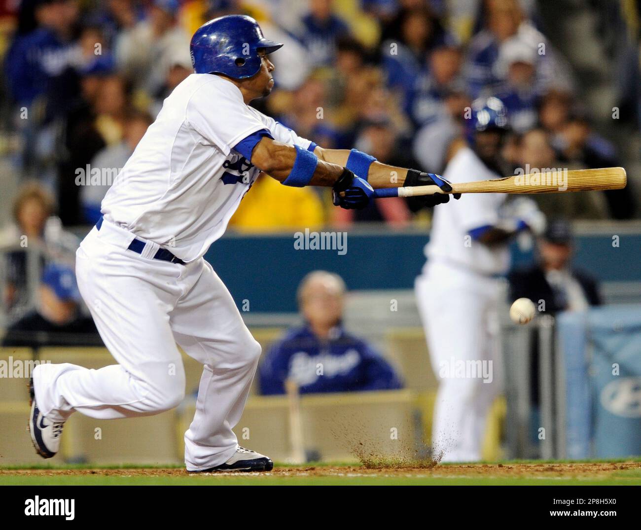 Los Angeles Dodgers' Rafael Furcal hits a drag bunt during the sixth ...