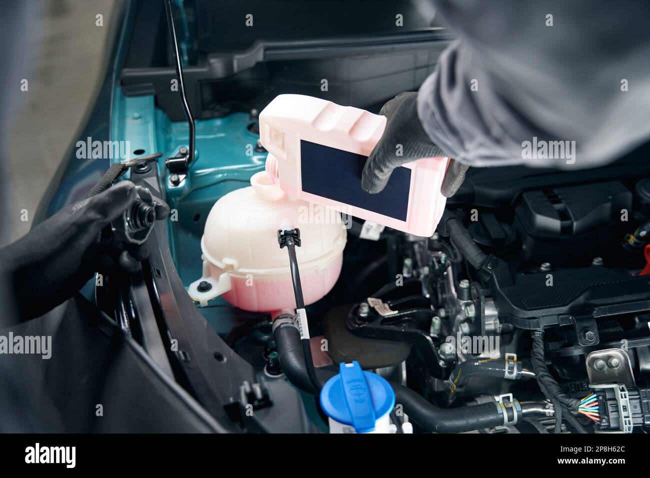 Man conducts full technical inspection of car Stock Photo - Alamy