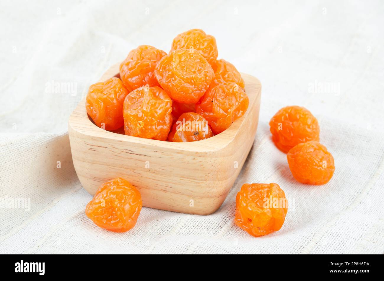 Delicious dried small yellow plums (mirabelles). Shallow depth of field ...