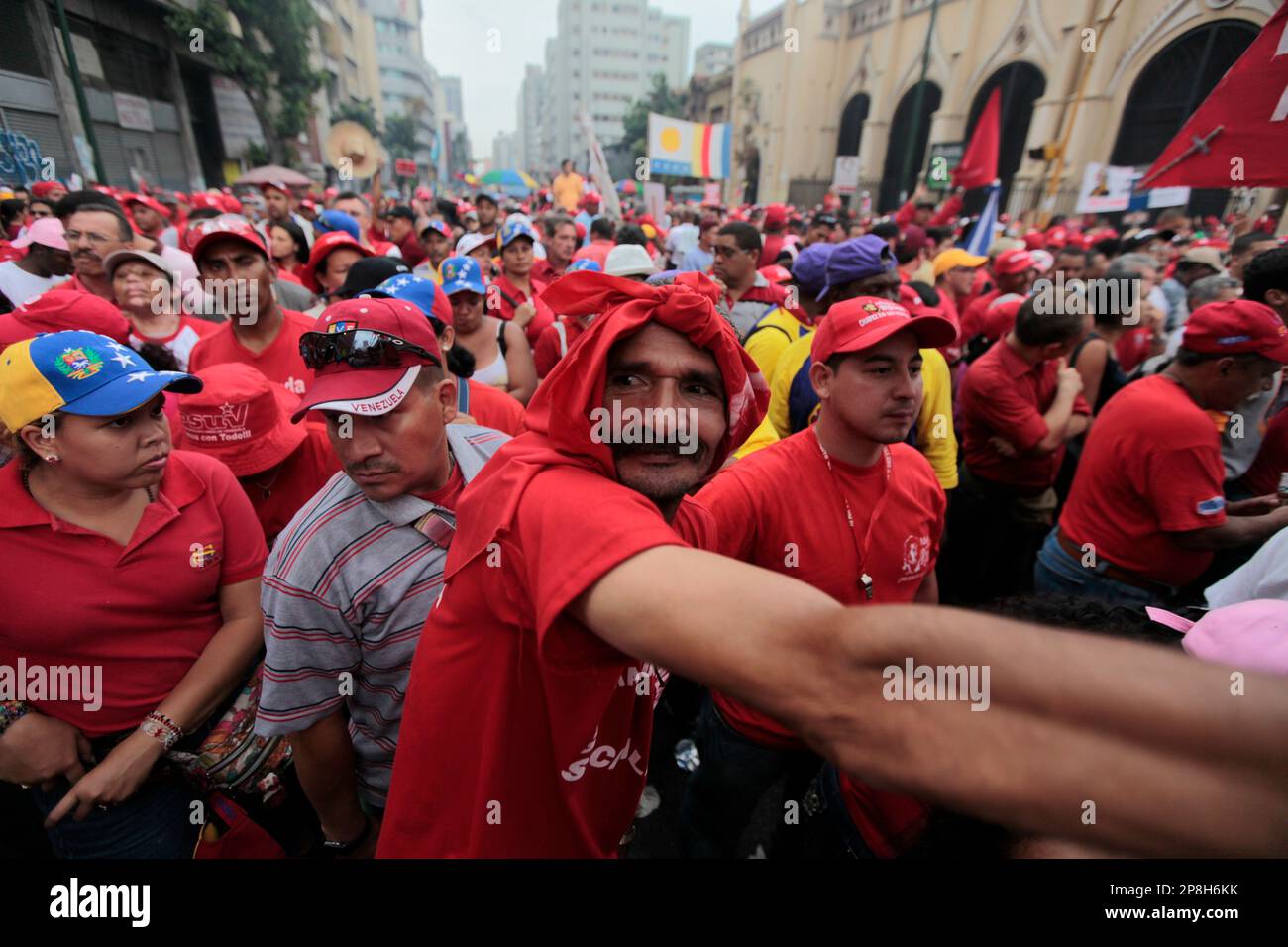 Supporters of Venezuela's President Hugo Chavez attend a rally as he ...