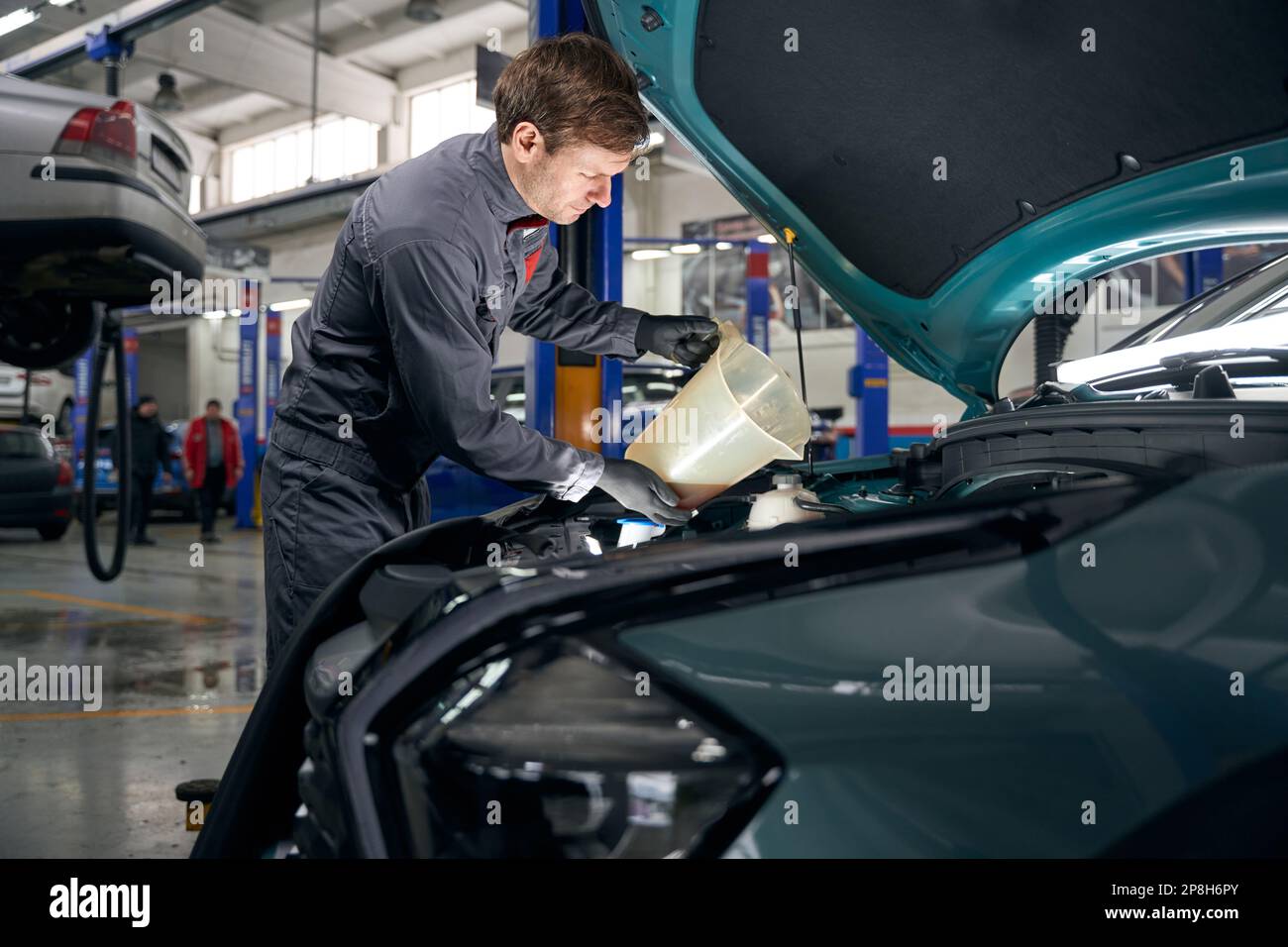Mechanic conducts full technical inspection of car Stock Photo - Alamy