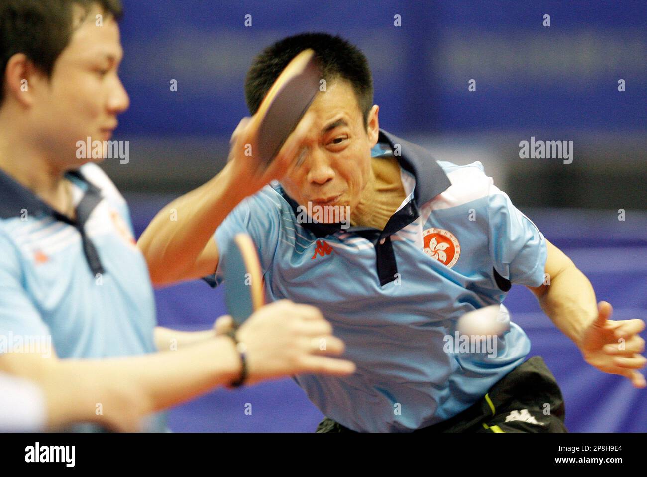 Li Ching, right, and Cheung Yuk of Hong Kong compete during a second ...