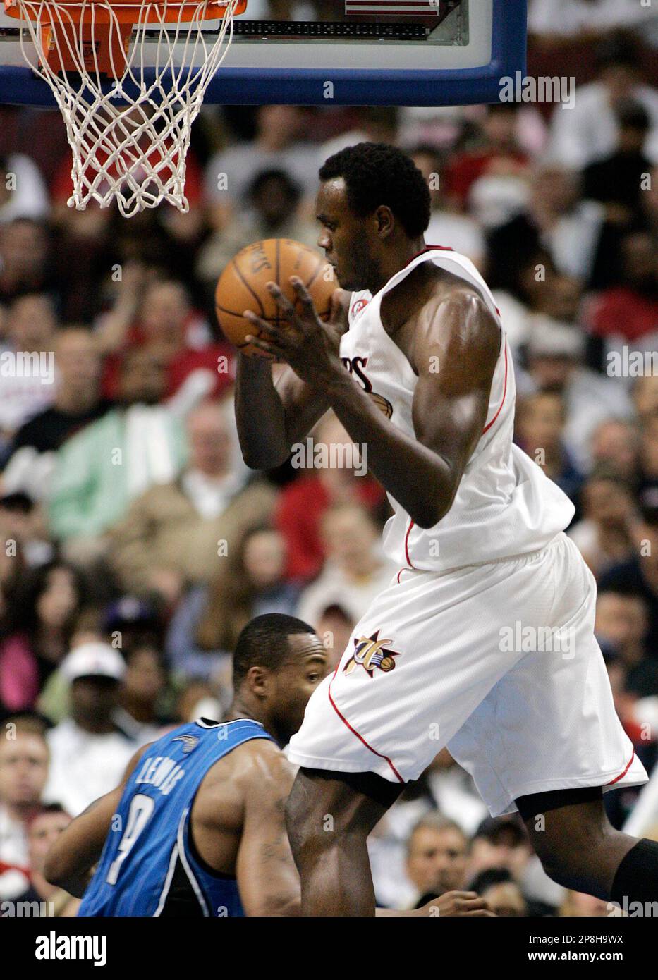 Philadelphia 76ers center Samuel Dalembert grabs the rebound in the ...