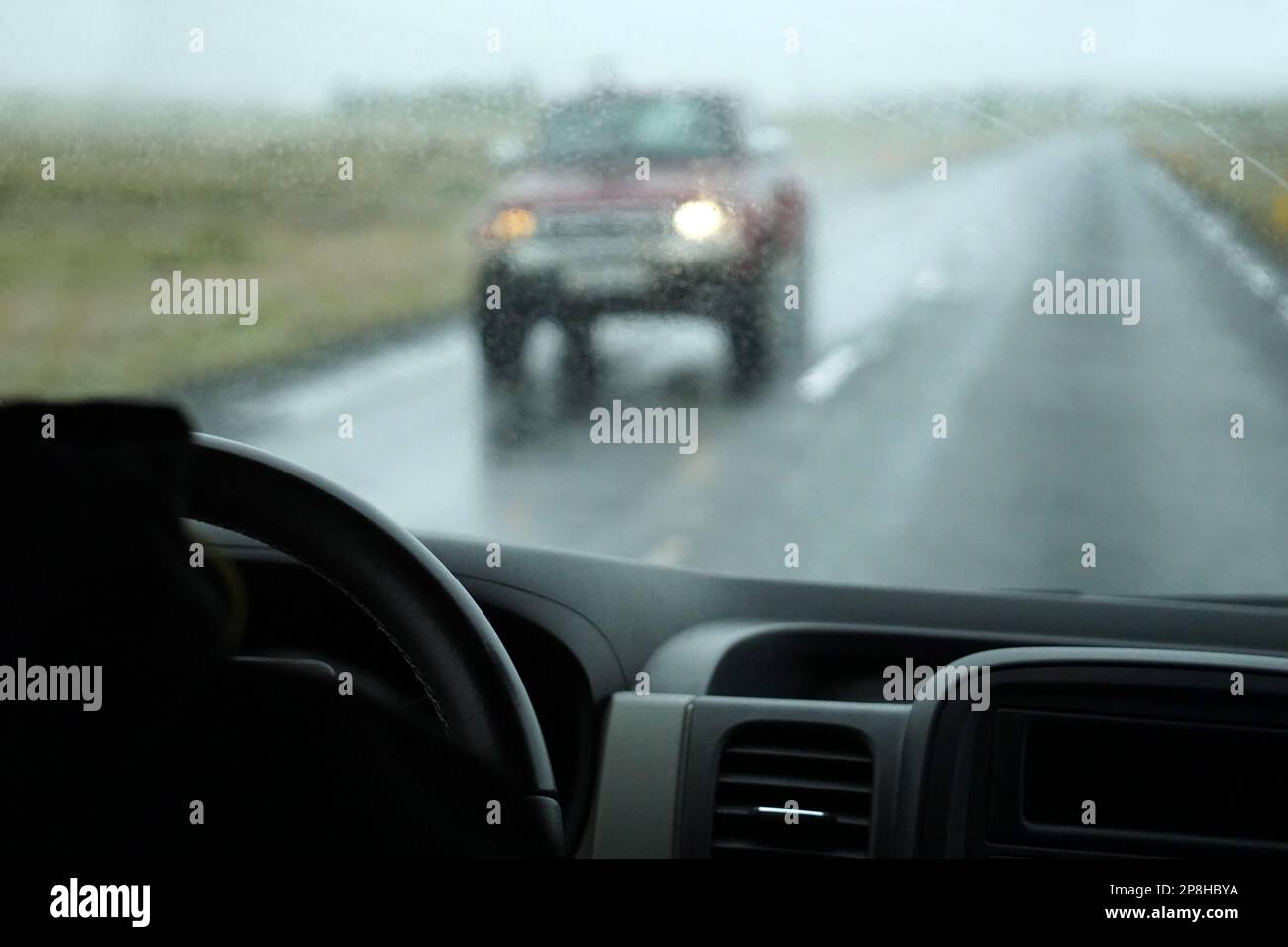 Driving a car - perspective of a driver Stock Photo - Alamy