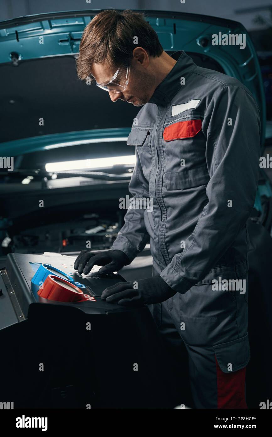 Mechanic conduct full technical inspection of air conditioner Stock ...