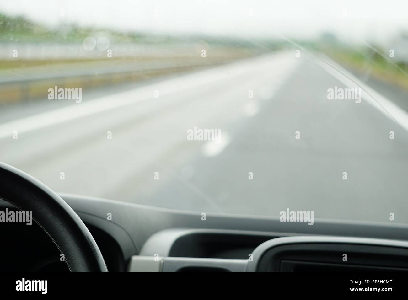 Driving a car on a highway - perspective of a driver Stock Photo - Alamy