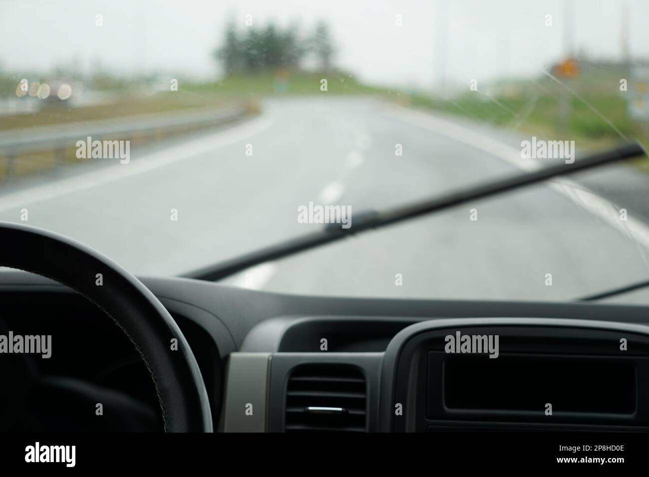 Driving a car on a highway - perspective of a driver Stock Photo - Alamy