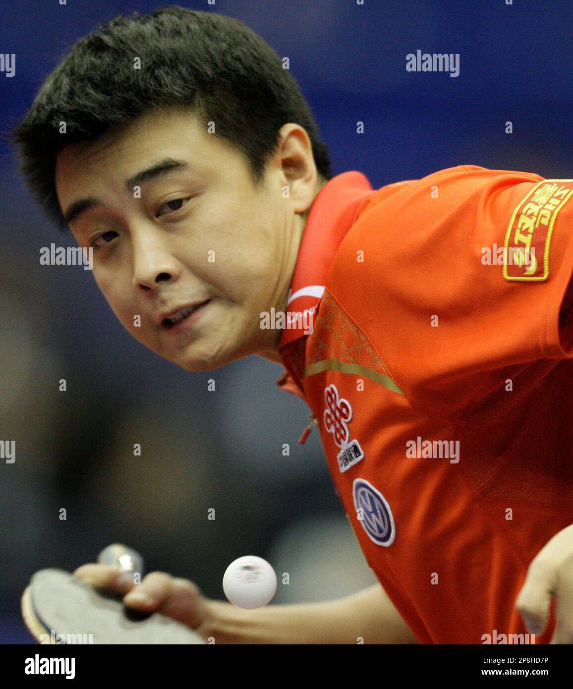 Wang Hao of China returns the ball against Cem Zeng of Turkey in the ...