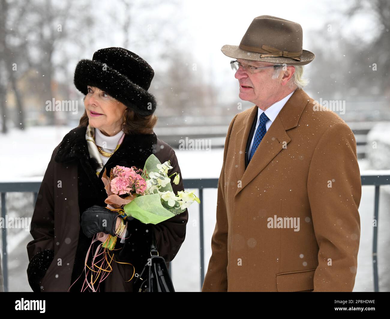 Sweden's King Carl XVI Gustaf and Queen Silvia walk from the concert hall to Västerås Castle ...