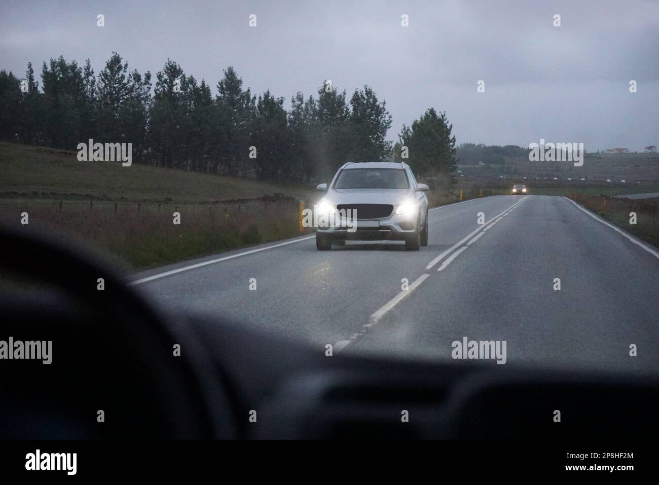 Driving a car - perspective of a driver Stock Photo - Alamy