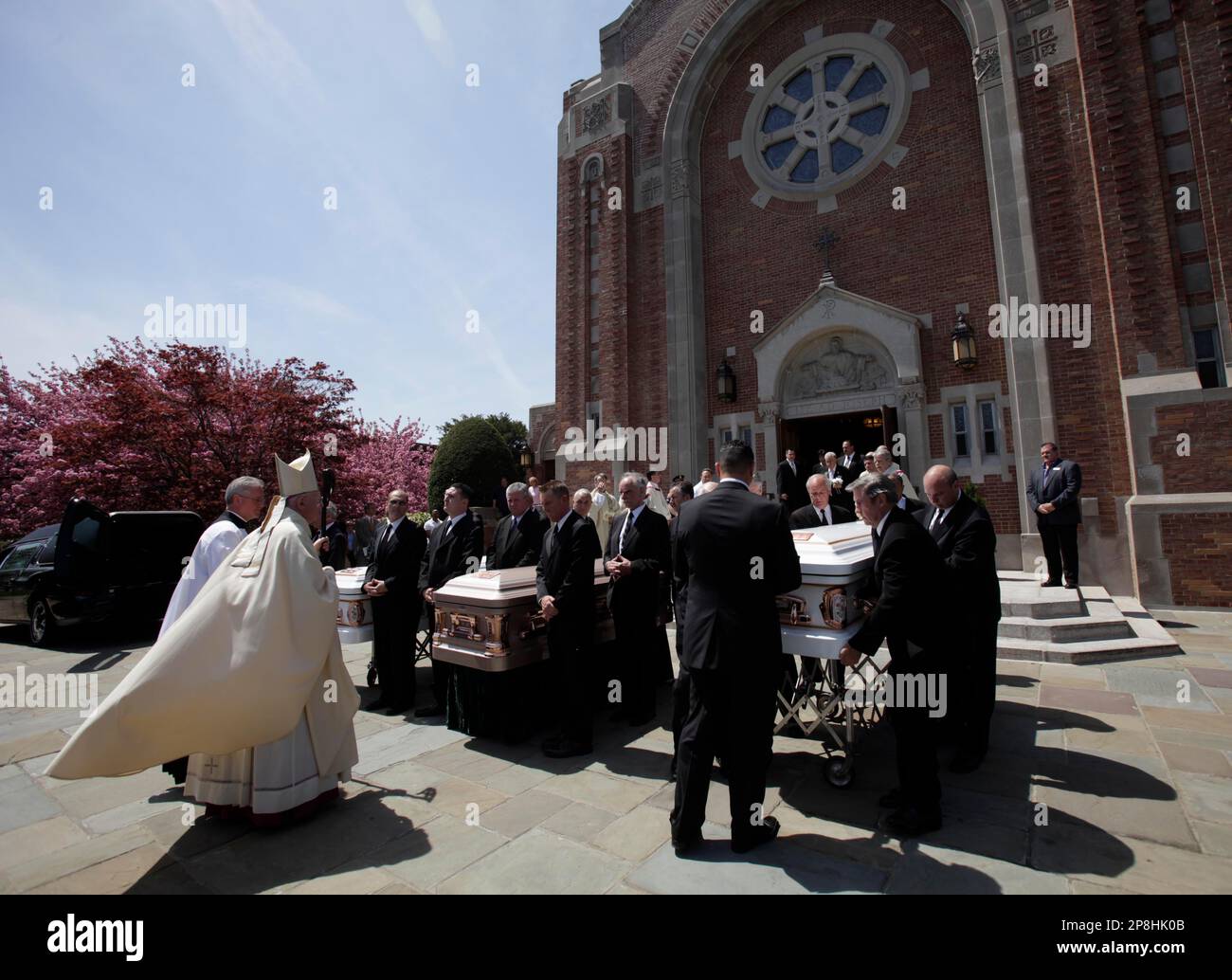 The three caskets of Betty Parente, 58, and her daughters Stephanie, 19 ...