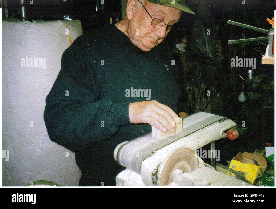 Harvey Poling sands the brazen alter for the scale model of the Old ...