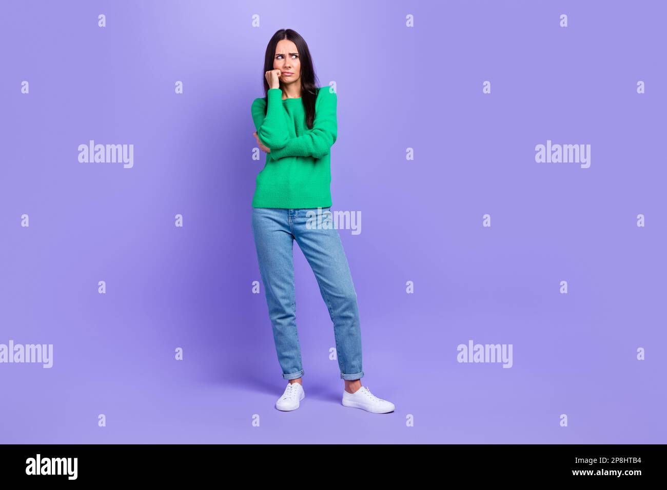 Full size photo of depressed offended lady look side hand fist on cheek ...