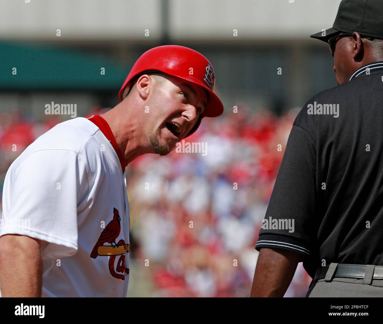 St. Louis Cardinals' Ryan Ludwick argues with first base umpire Chuck ...