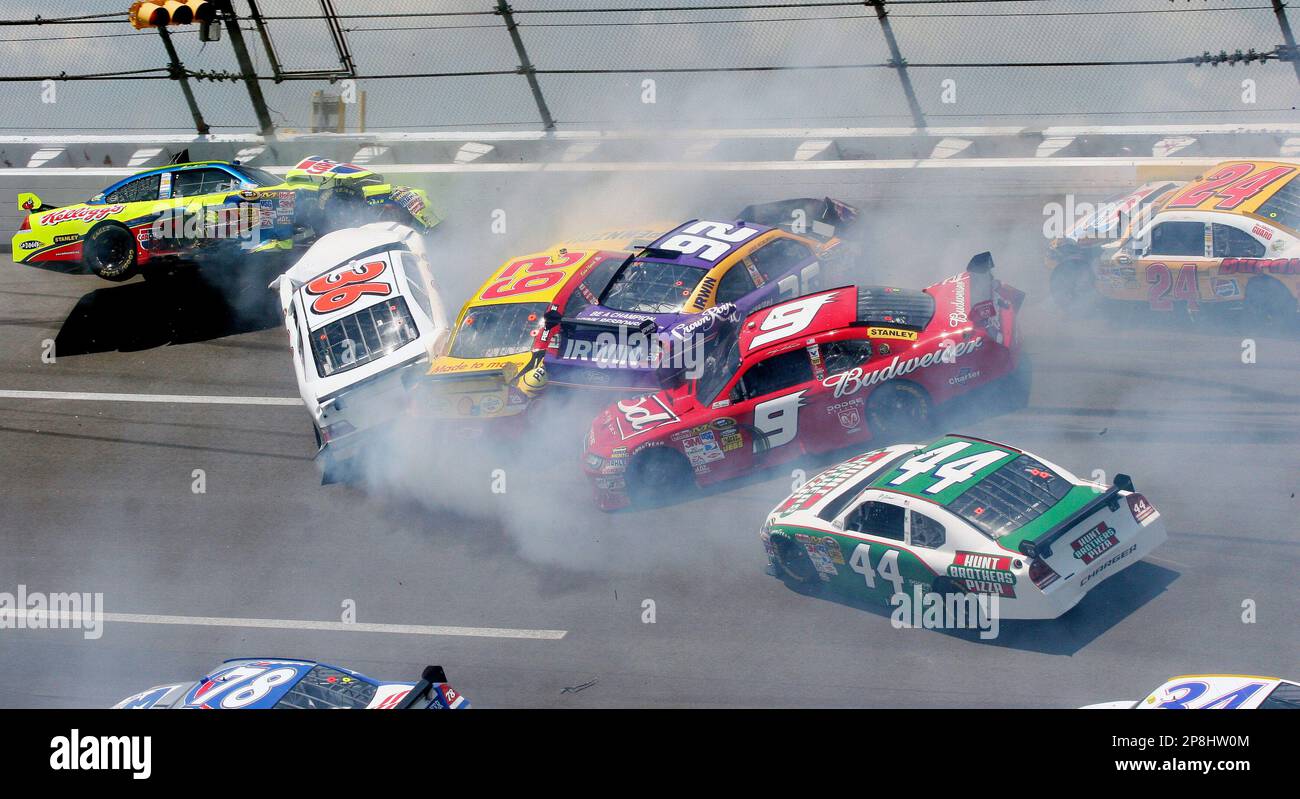 NASCAR drivers Mark Martin, left, Scott Riggs (36), Kevin Harvick (29 ...