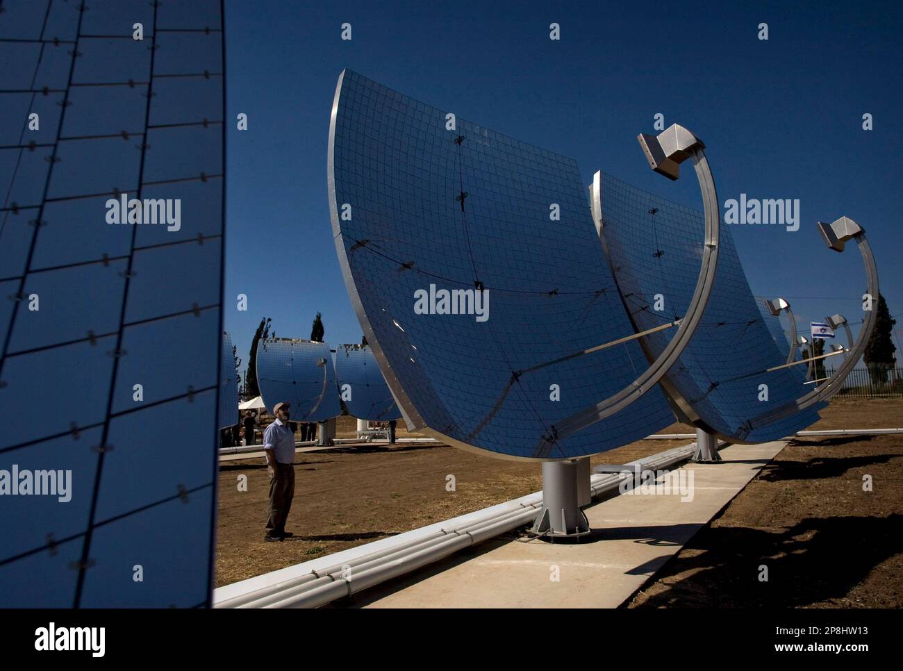 Solar dishes are seen at the new solar farm which according to its ...