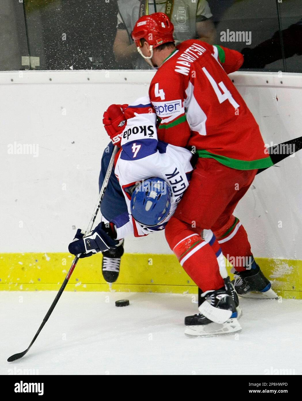 Belarus' Alexander Makritski, right, checks Slovakia's Jiri Bicek ...