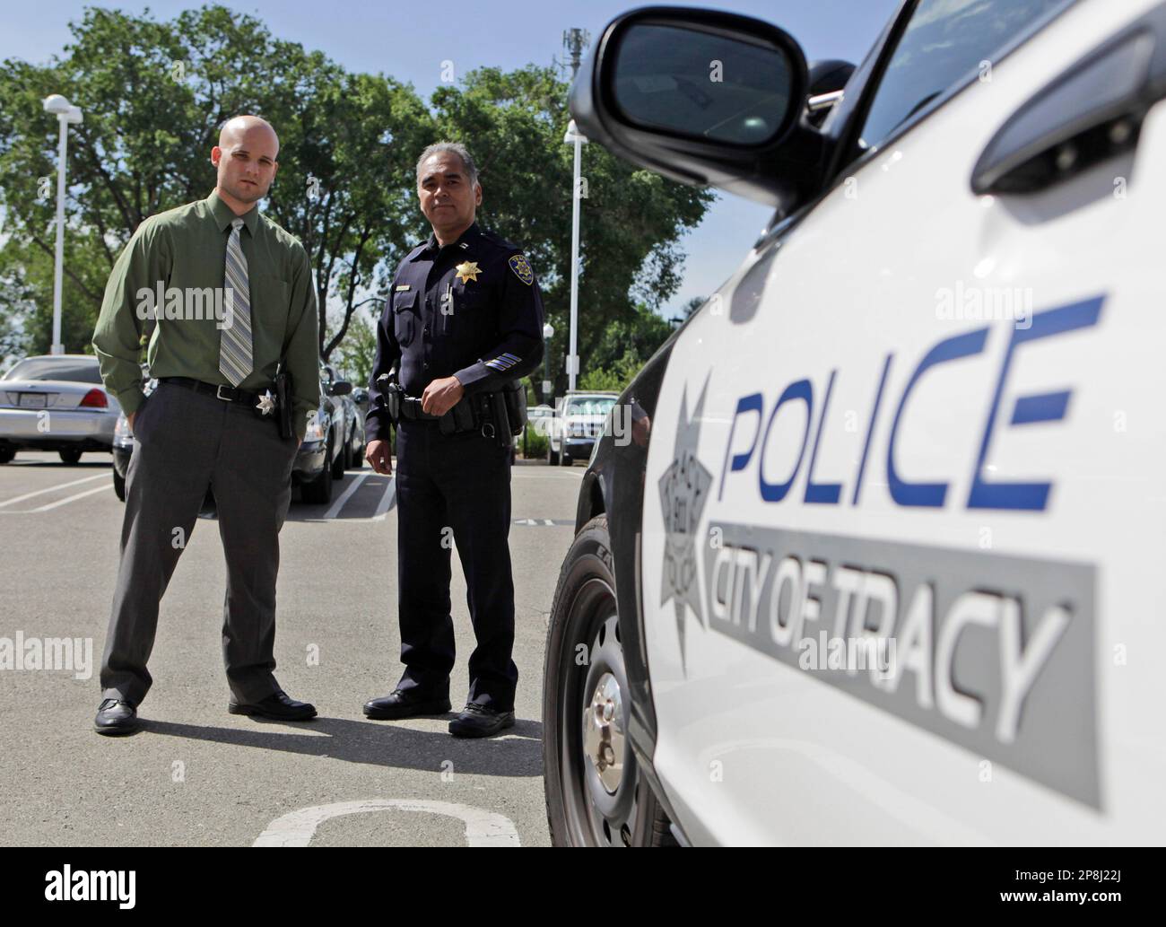 In this Thursday, April 23, 2009 photo officers Nate Cogburn, left, and ...