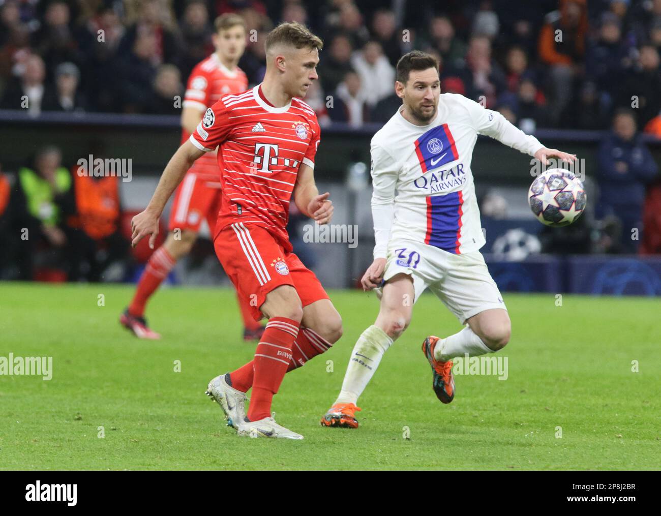 Munich, Germany. , . 6 Joshua Kimmich of FcBayern vs Lionel MESSI, PSG ...