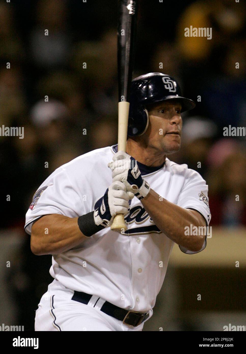 San Diego Padres' Brian Giles watches his game winning base hit head ...