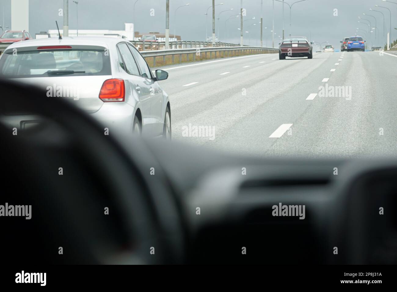 Driving a car on a highway Stock Photo - Alamy