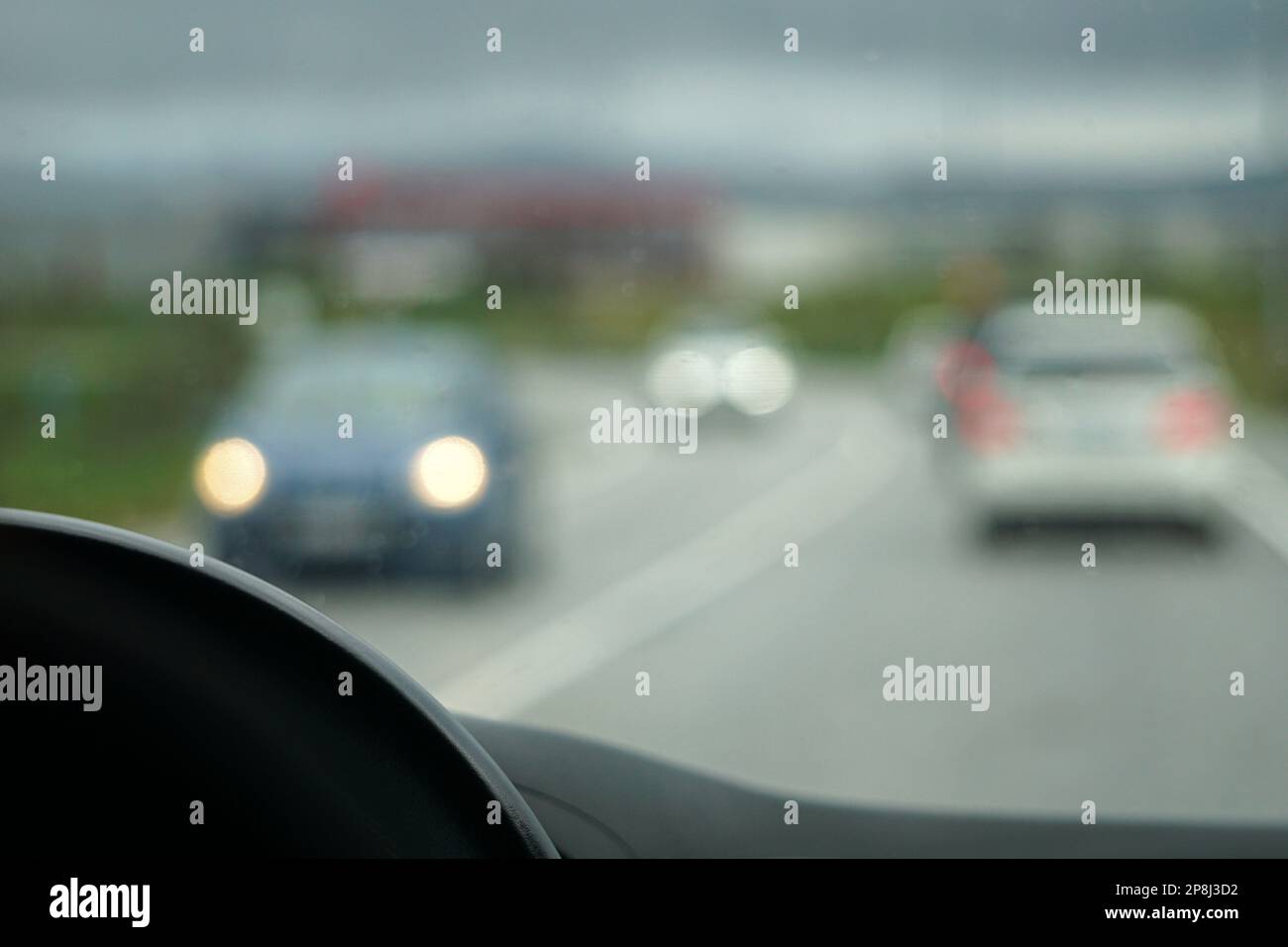 Driving a car - perspective of a driver Stock Photo - Alamy