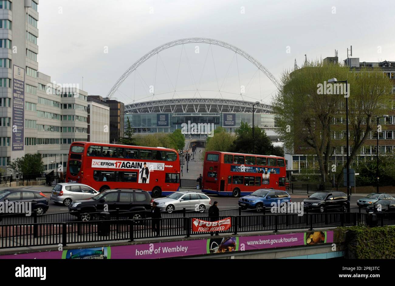 Buses pass Wembley Stadium in London, Friday April 24, 2009. The ...