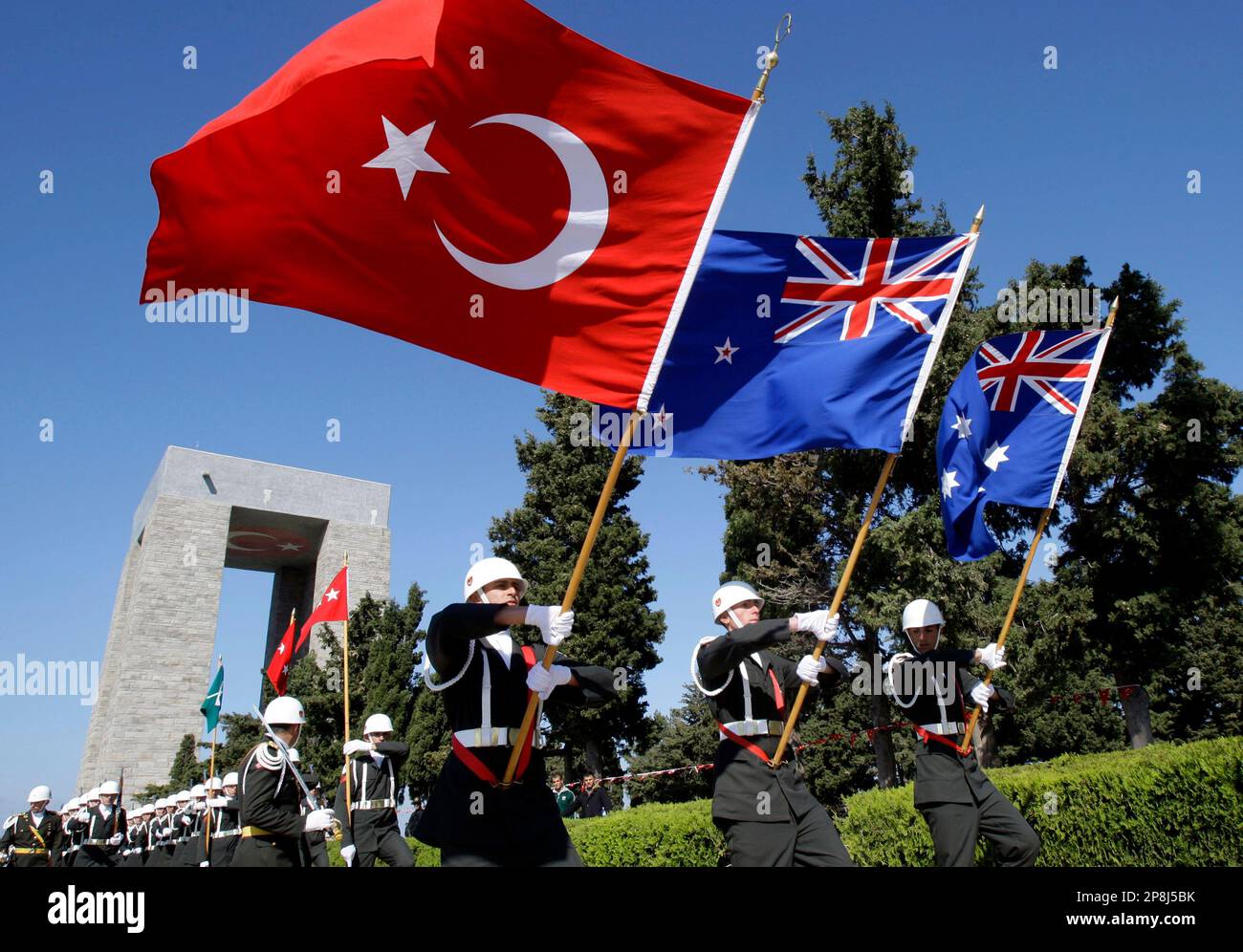 Turkish soldiers, holding national flags of Turkey, Australia and New ...