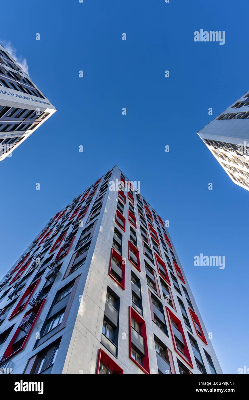 The facade of the new residential high-rise buildings against the sky ...