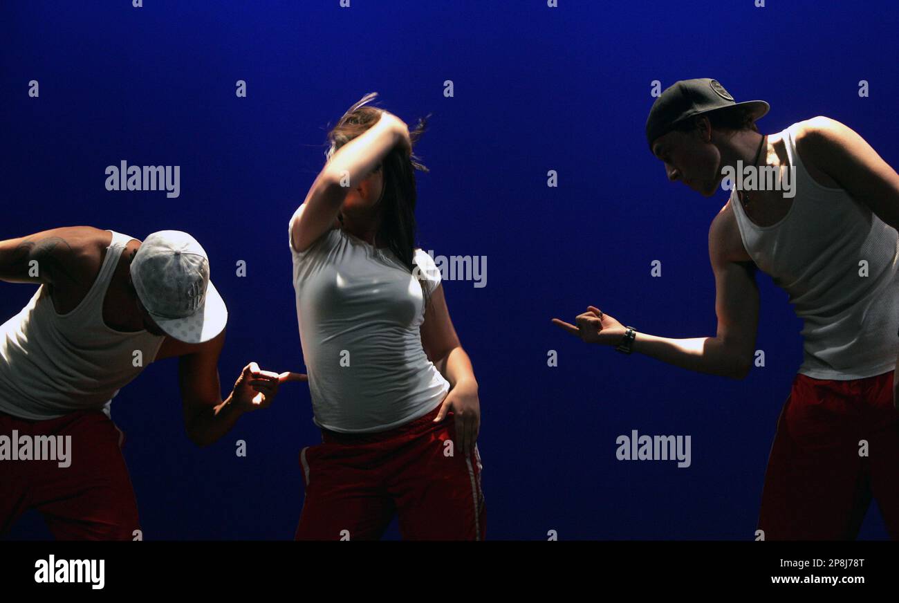 Members of a Jordanian dance troupe perform, during their show in Amman ...
