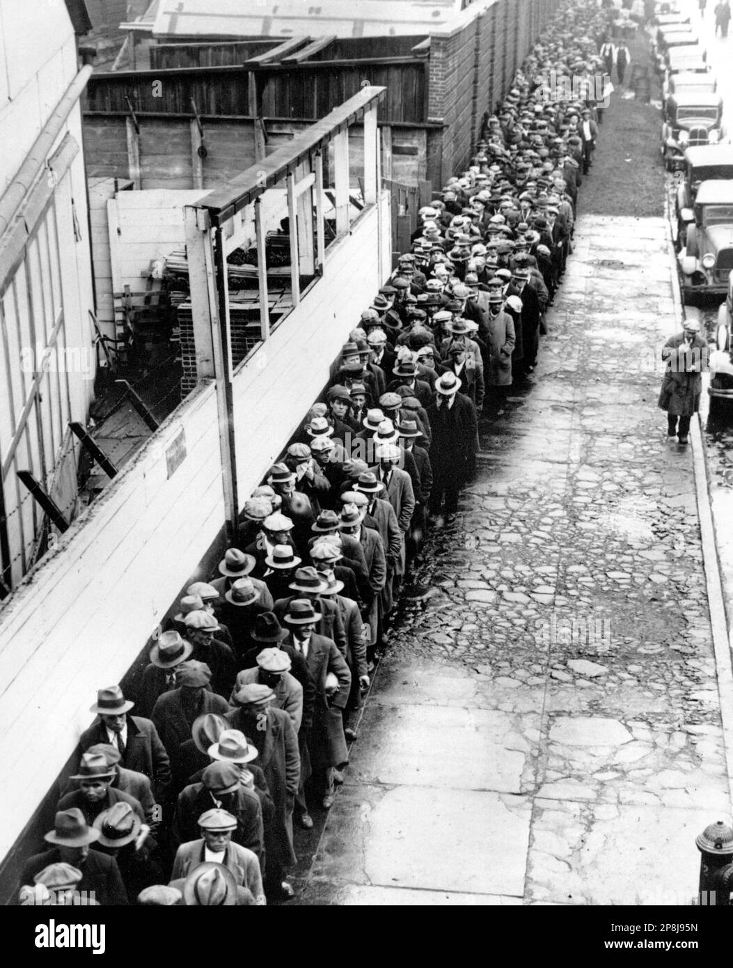 FILE - In this 1932 file photo, long line of jobless and homeless men ...