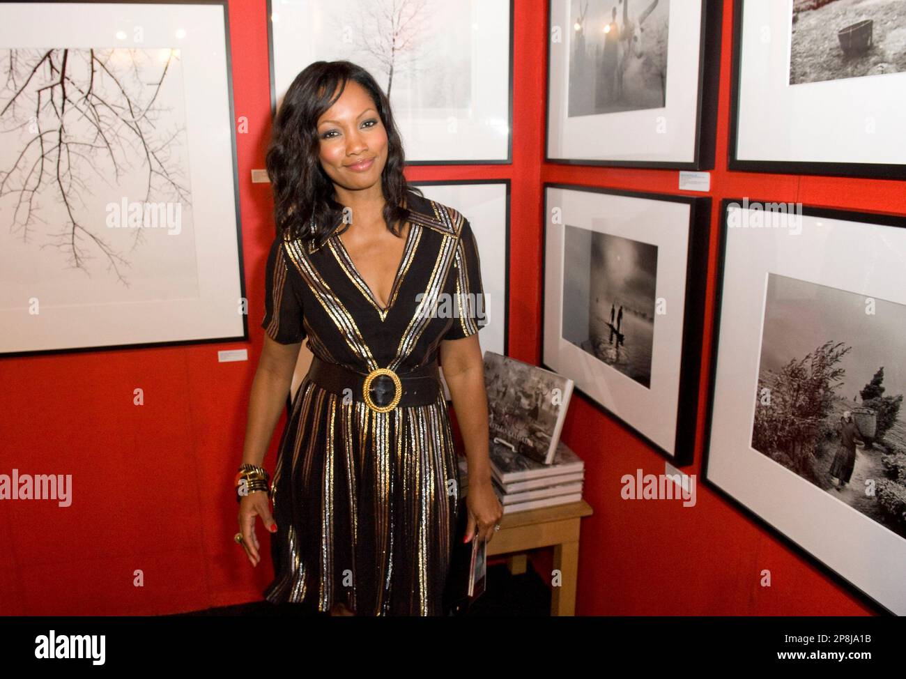 Actress Garcelle Beauvois-Nilon looks a rare photographs as she attends ...