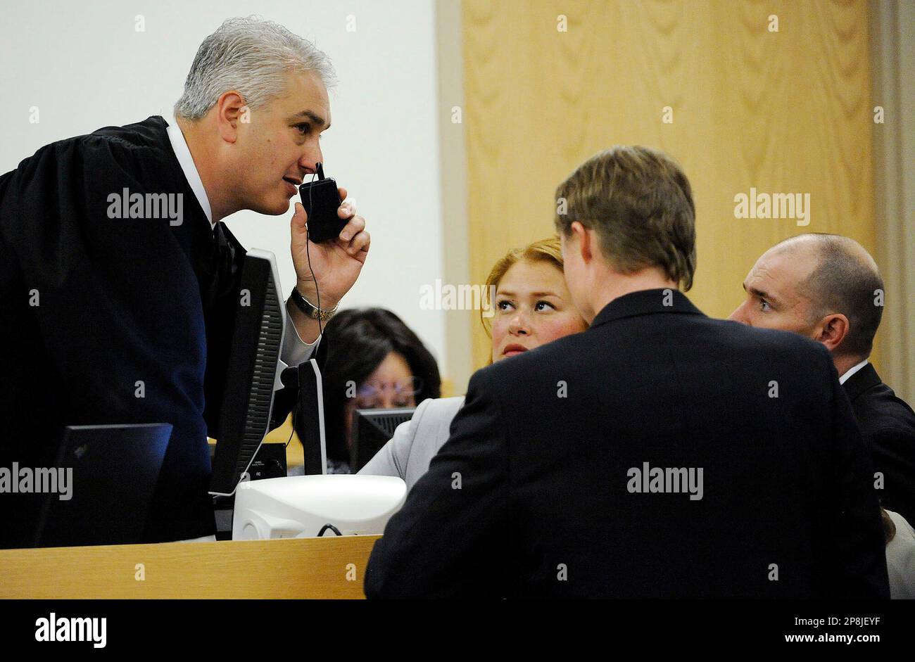 Judge Marcelo Kopcow, left, talks with Deputy District Attorney Brandi ...