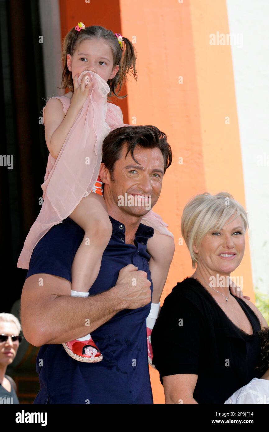 Hugh Jackman, poses with his daughter, Eva, 3, and his wife, Deborra ...