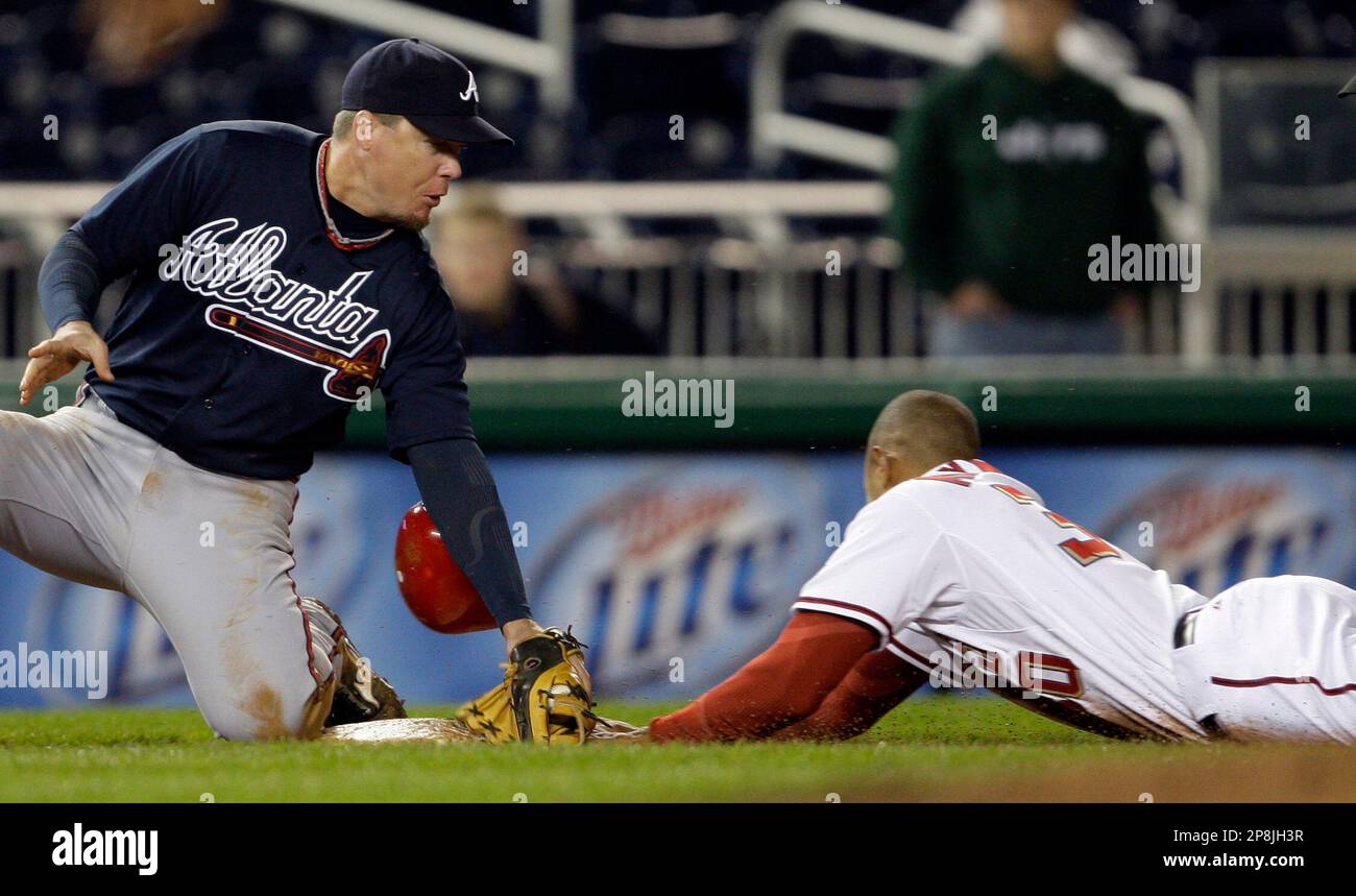 Washington Nationals' Justin Maxwell slides safely as he steals third ...