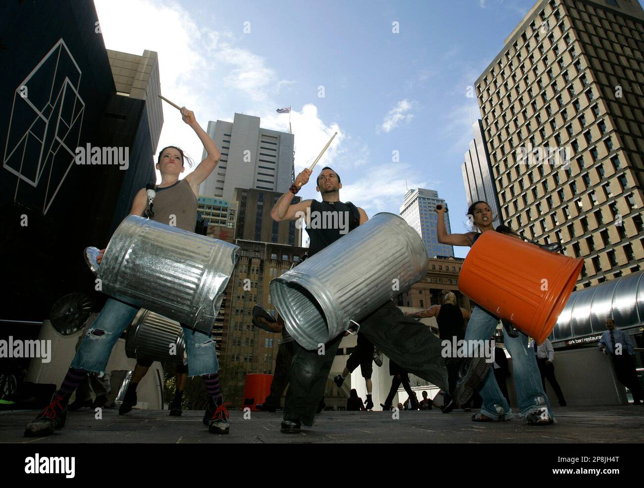 Members from the Stomp troop perform a routine for the public in Sydney ...