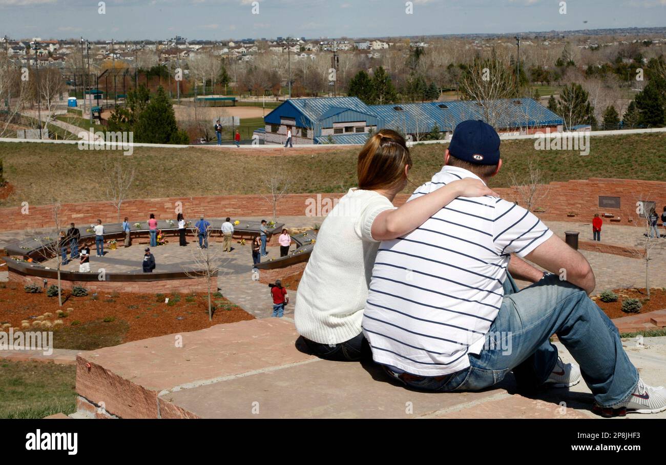 April Yeager, left, comforts Jason Thompson, who was a senior at ...