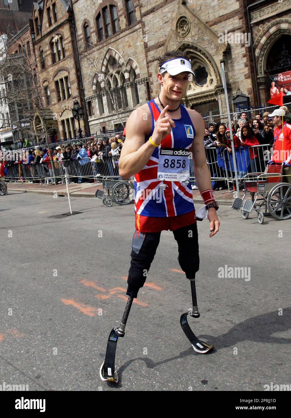 Double amputee Richard Whitehead of Great Britain gestures at the ...