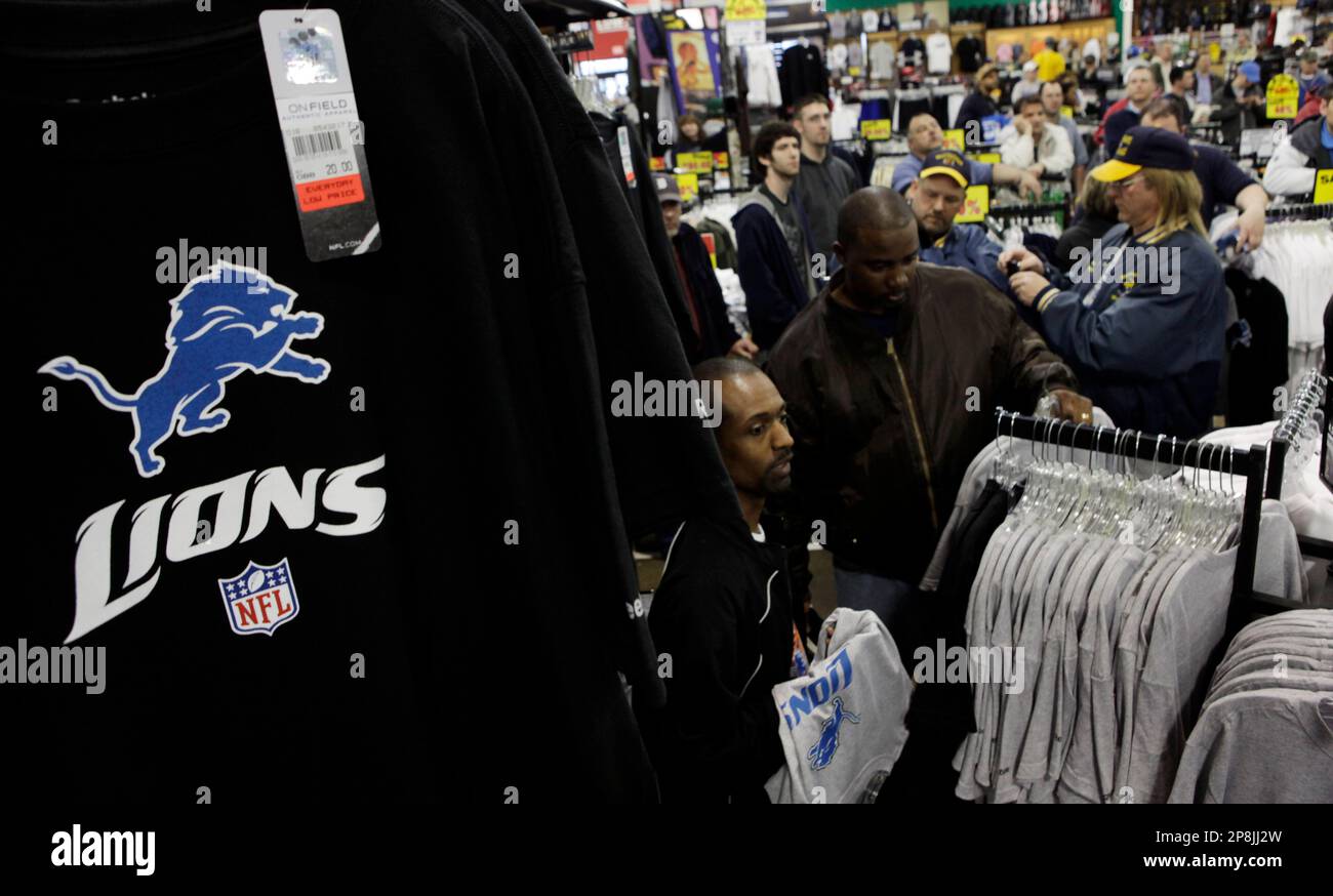 Detroit Lions merchandise is shown for sale after the team unveiled ...