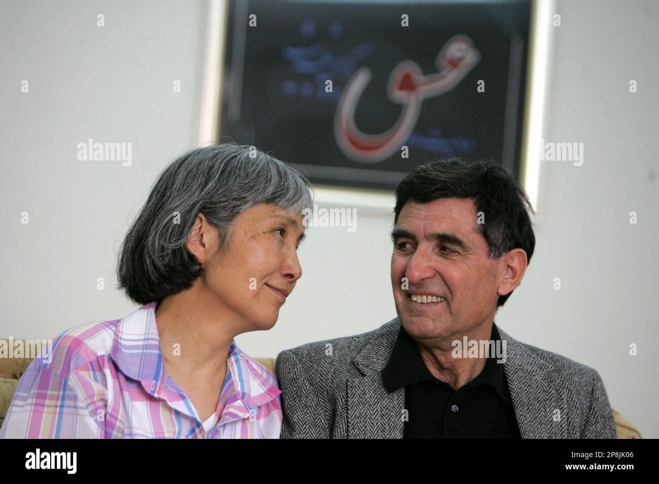 In this photo taken April 18, 2009, Reza Saberi, right, and his wife ...