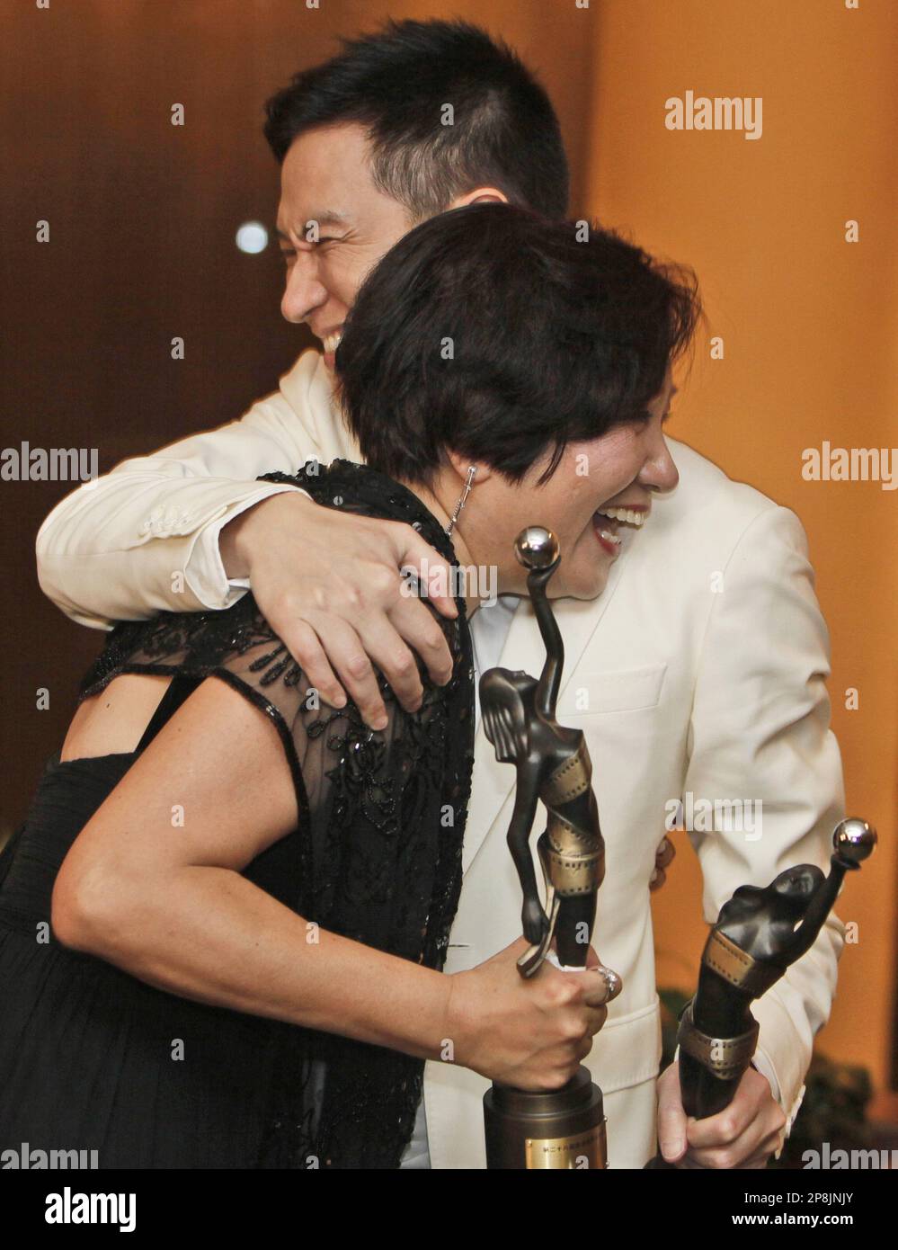 Hong Kong actor Nick Cheung Ka Fai and Hong Kong actress Paw Hee Ching celebrate with the ...