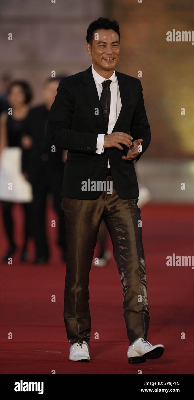 Hong Kong actor Simon Yam arrives at the Hong Kong Film Awards ...